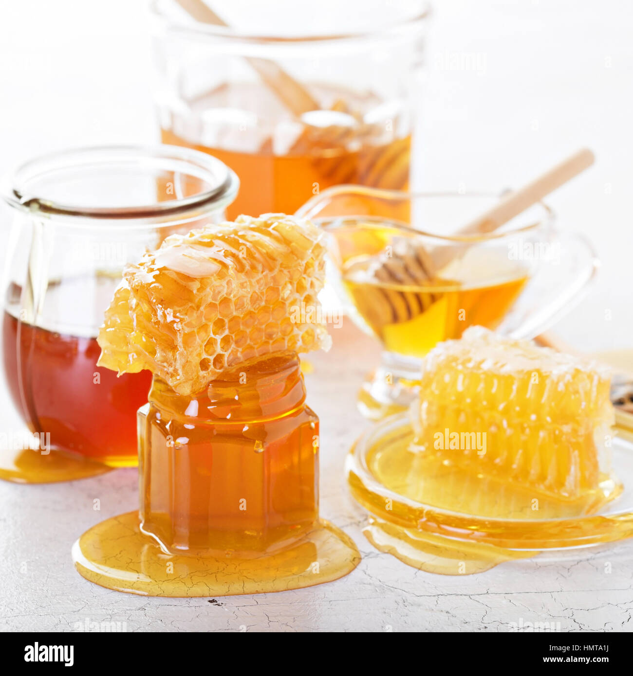 Various types of honey in glass jars and honeycomb Stock Photo - Alamy