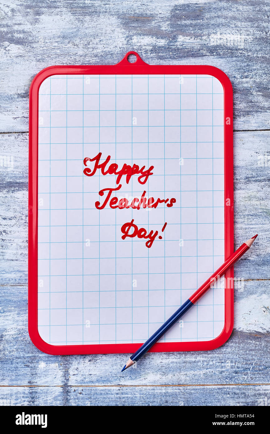 Clipboard and double pencil Stock Photo - Alamy