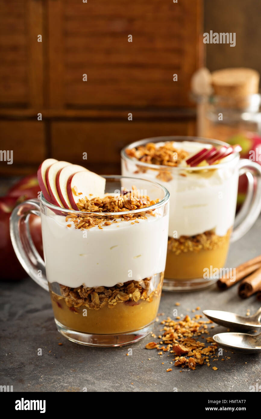 Layered yogurt and applesauce parfait with granola Stock Photo - Alamy