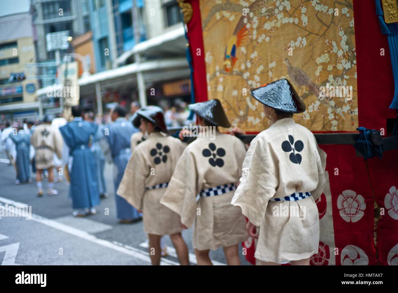 Tourist explores Kyoto riding a traditional Rickshaw Stock Photo - Alamy