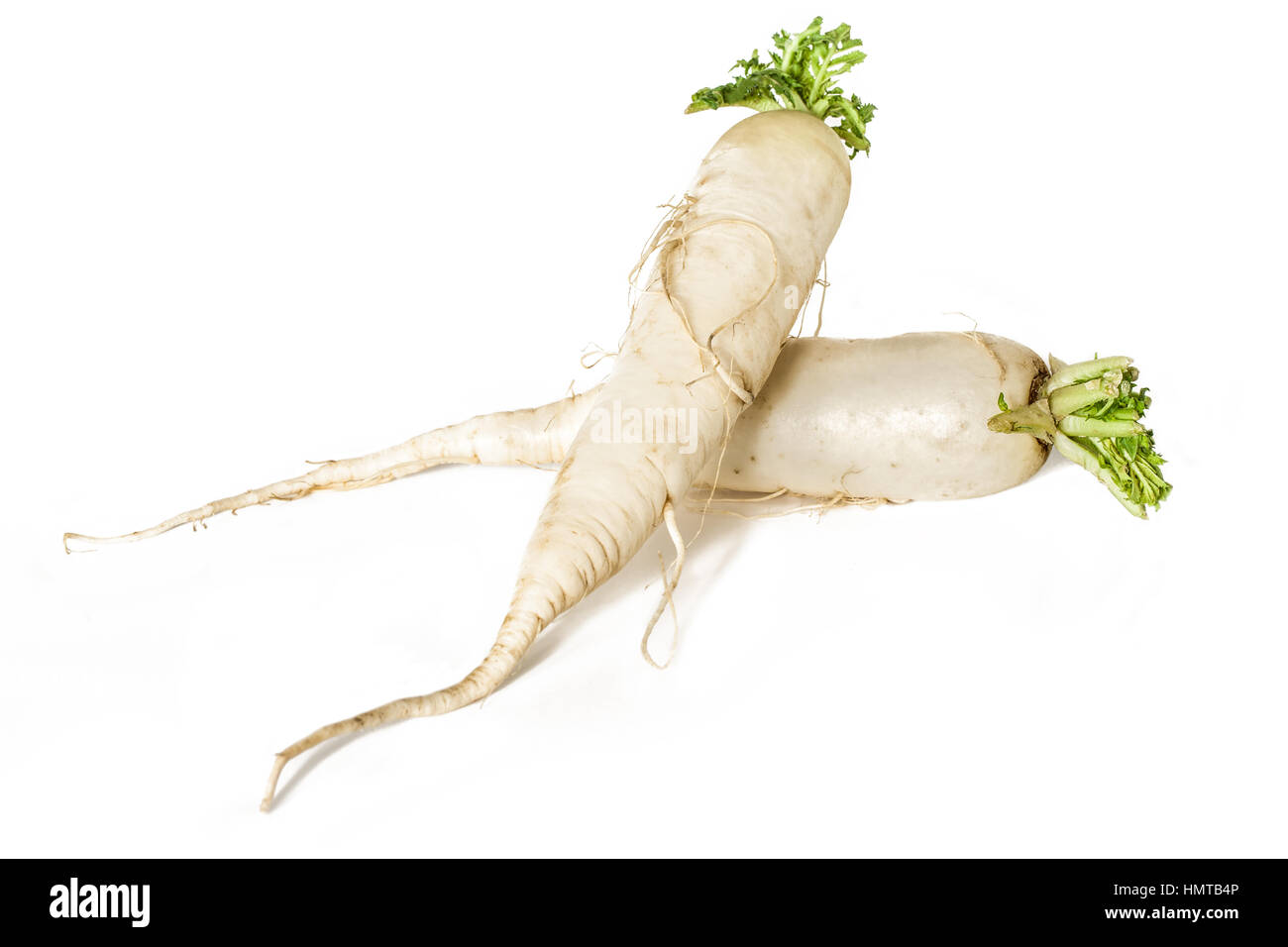 Raw Daikon radish isolated on white background Stock Photo - Alamy