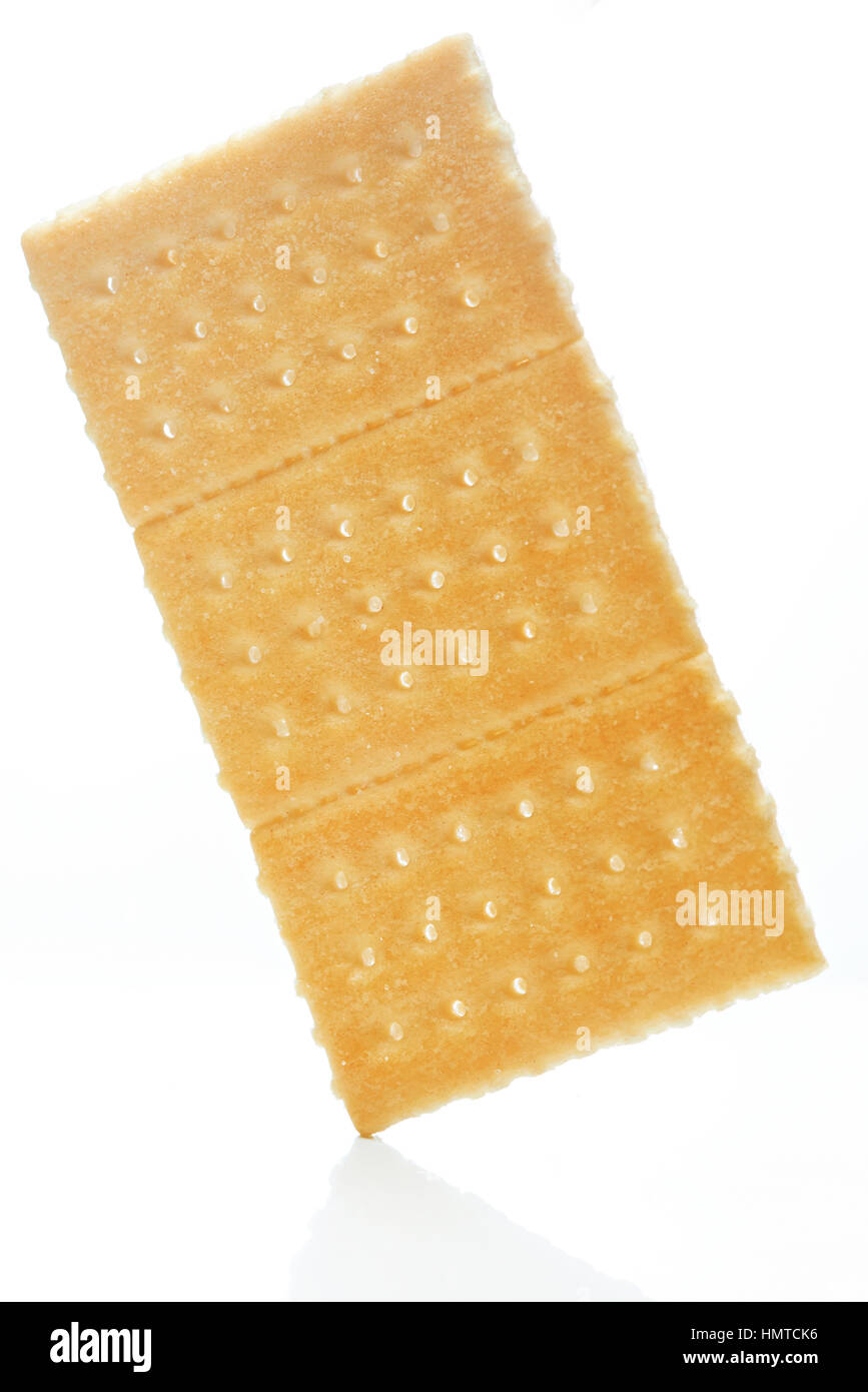 one cracker cookie isolated on white stand on corner Stock Photo - Alamy