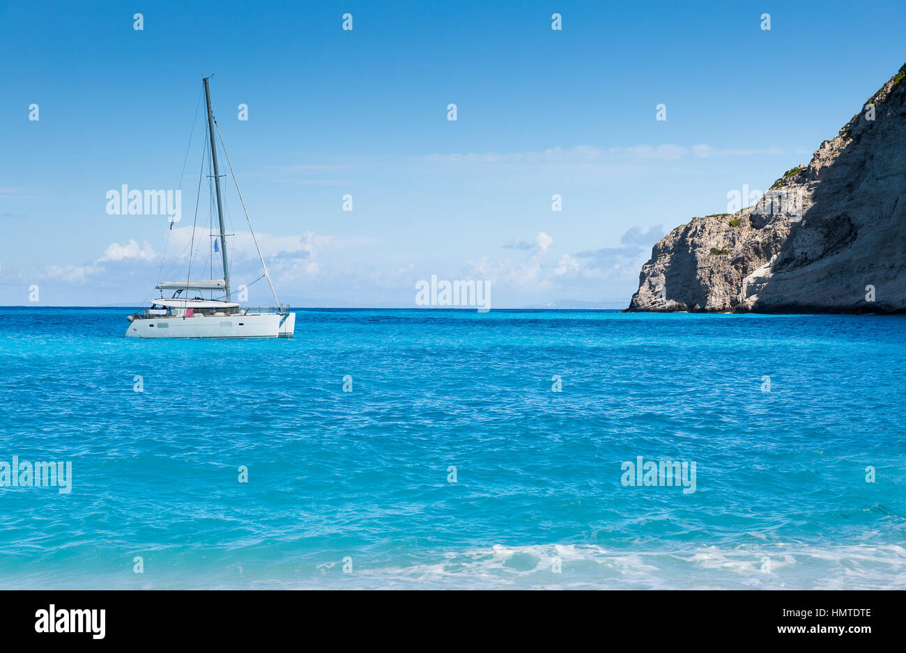 White catamaran in the Blue Lagoon Stock Photo - Alamy