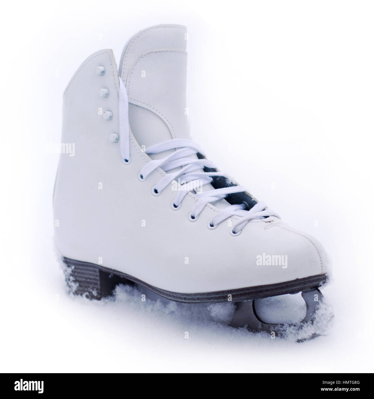 front view of white classical leather iceskate shoe with the metallic ...