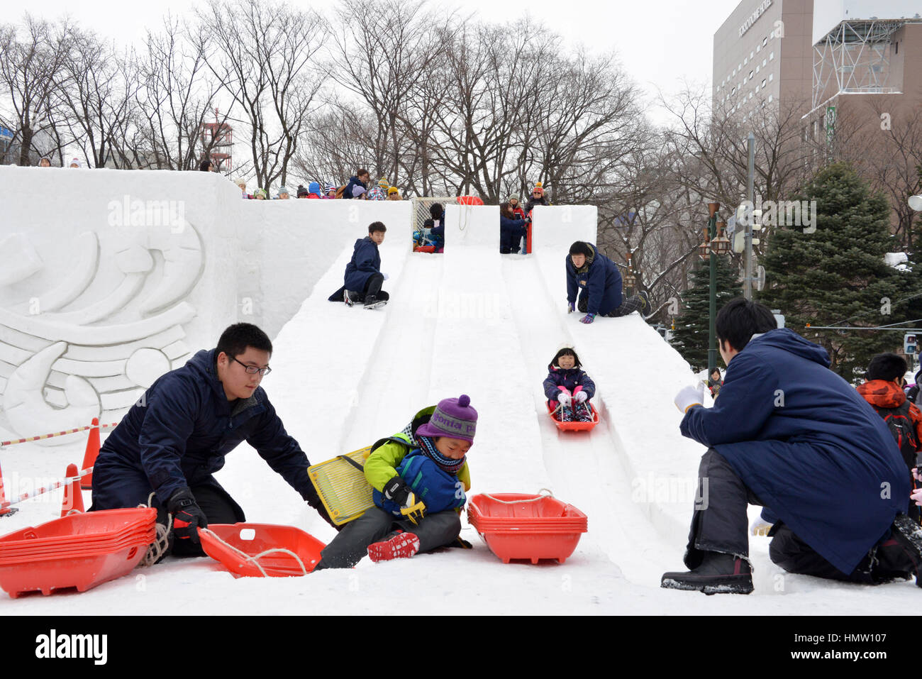 Sapporo, Japan. 6th Feb, 2017. Children play on the snow slides at the ...