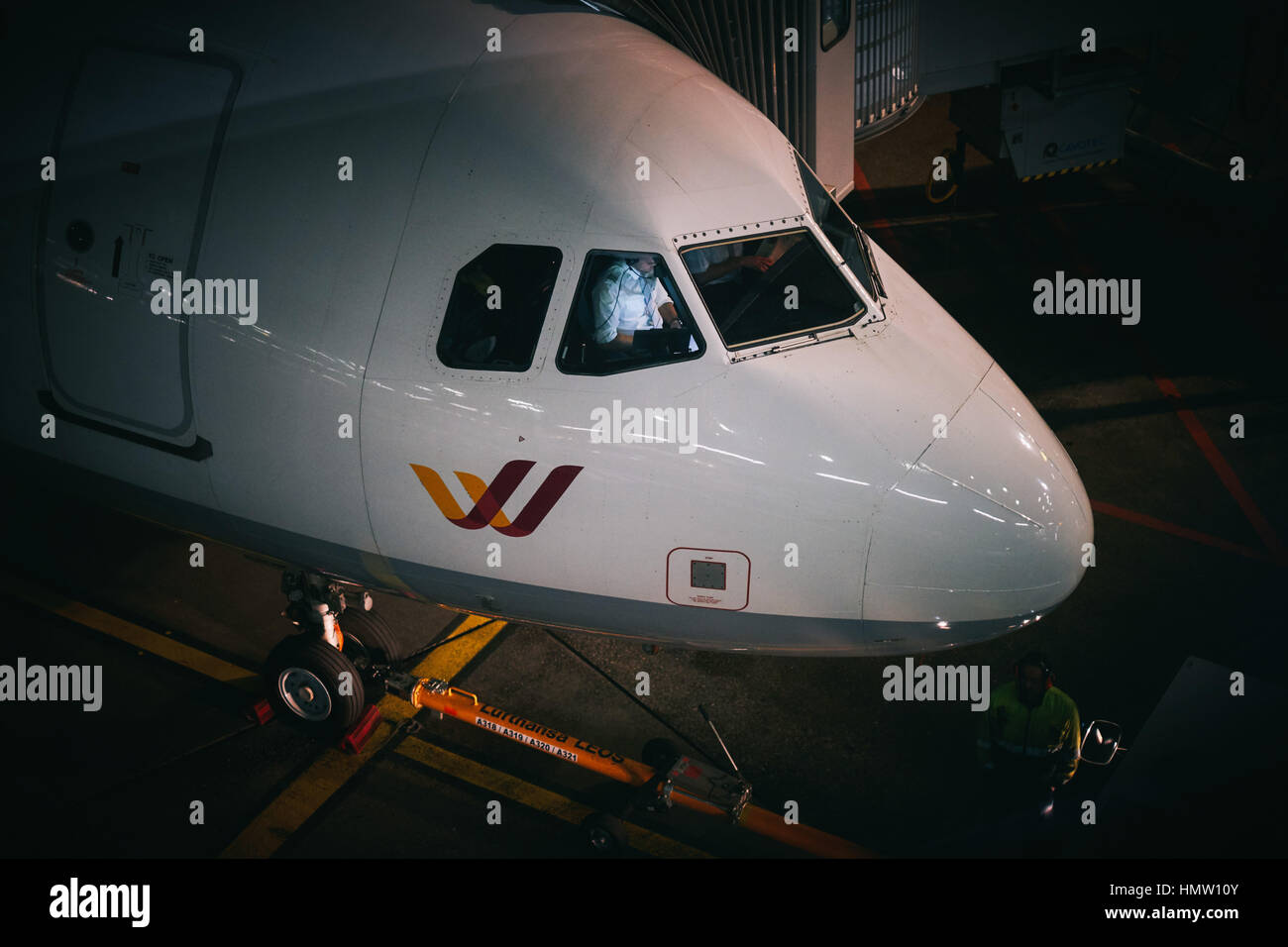 A pilot is seated in the cockpit of a plane of the airline "Germanwings ...