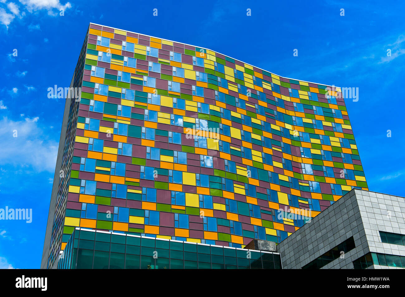 Modern building with colorful patchwork facade in the centre of ...