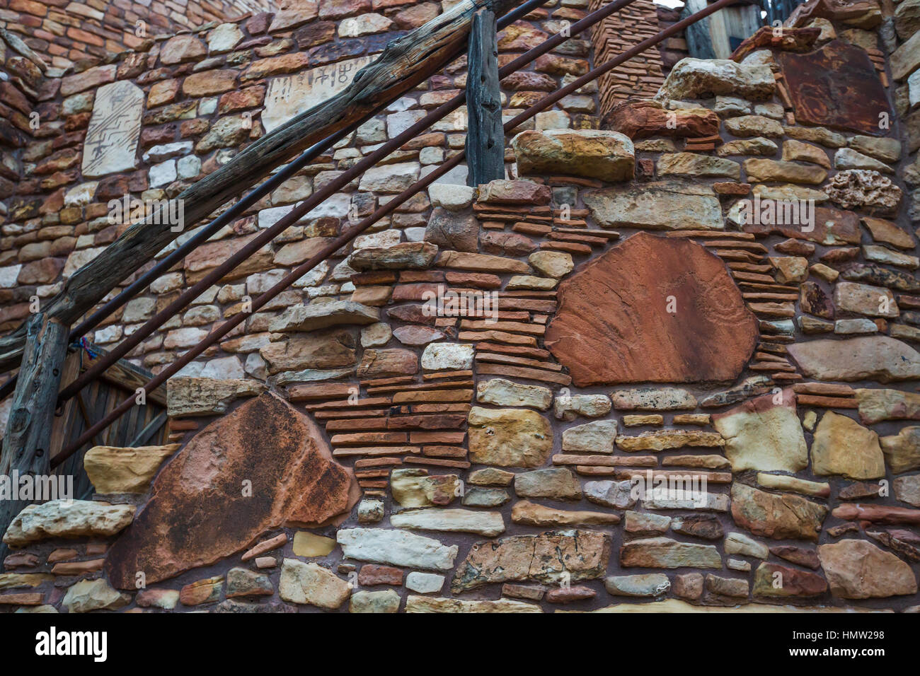 Decorated rocks within wall near the stairway to the Kiva room at the ...