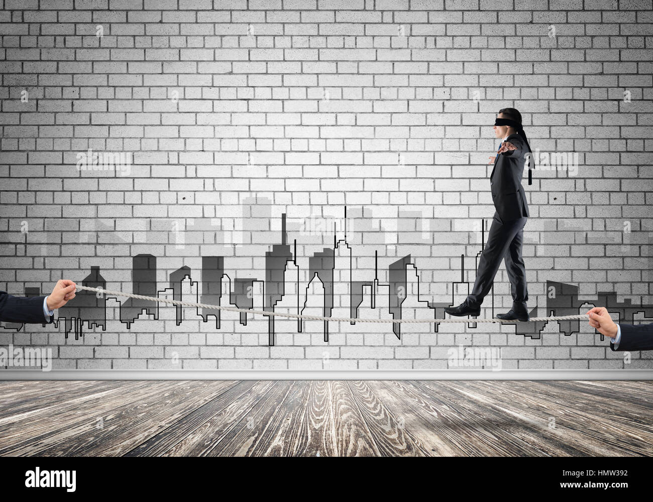 Business concept of risk support and assistance with man balancing on ...