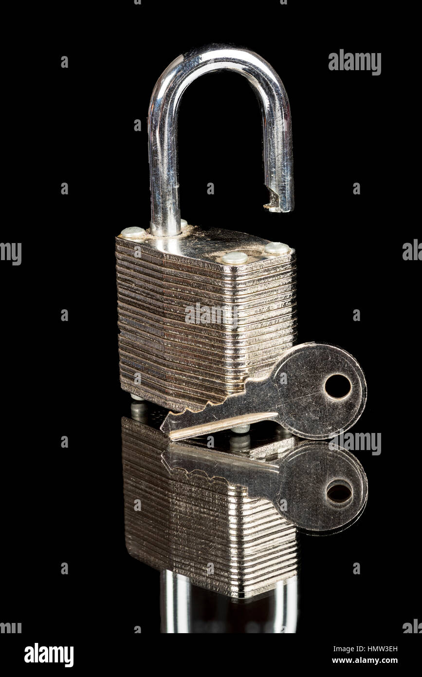 Secure metal safety lock with key Stock Photo - Alamy