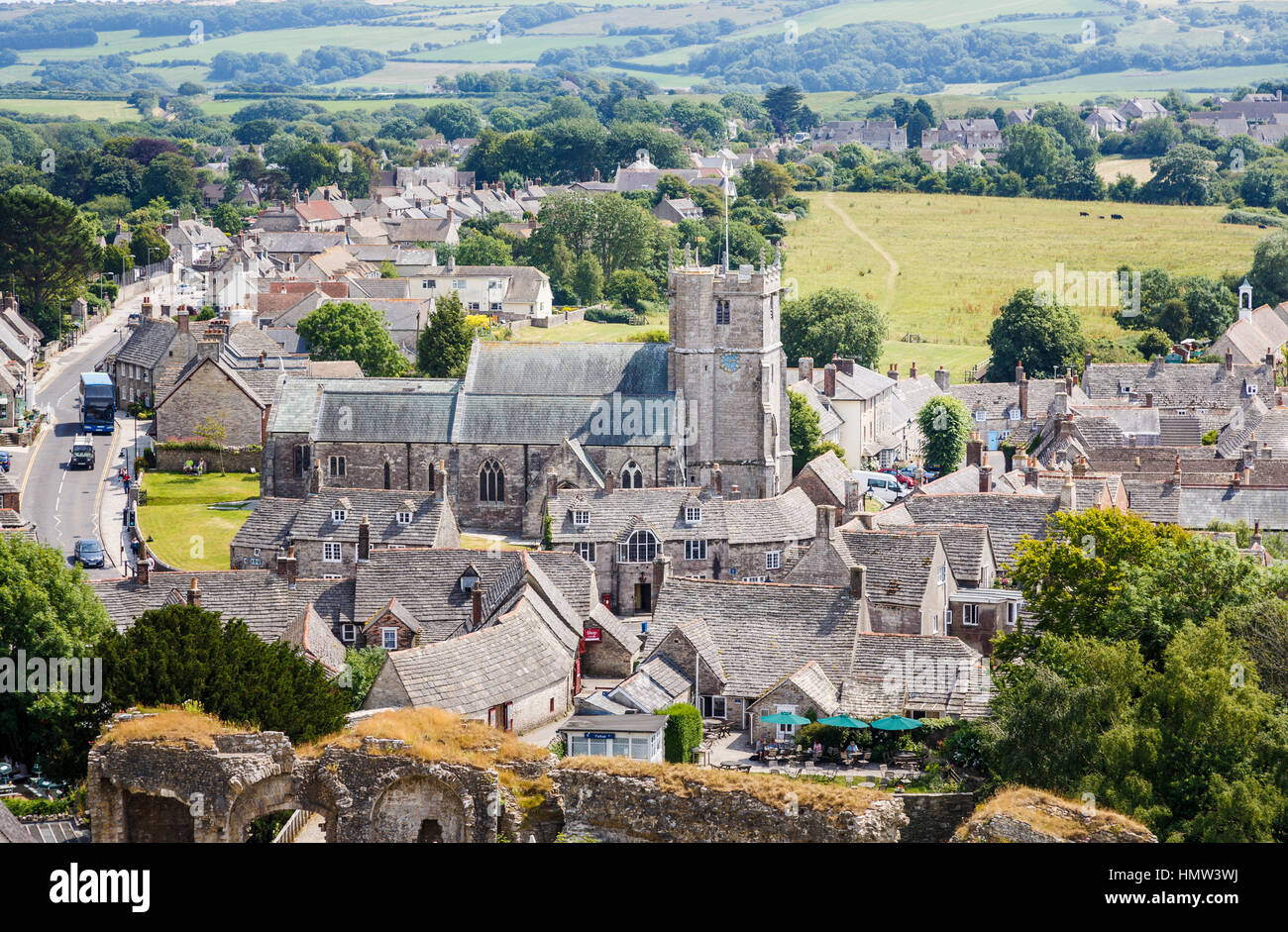 Rooftop view over the pretty, unspoiled village of Corfe Castle, Dorset ...