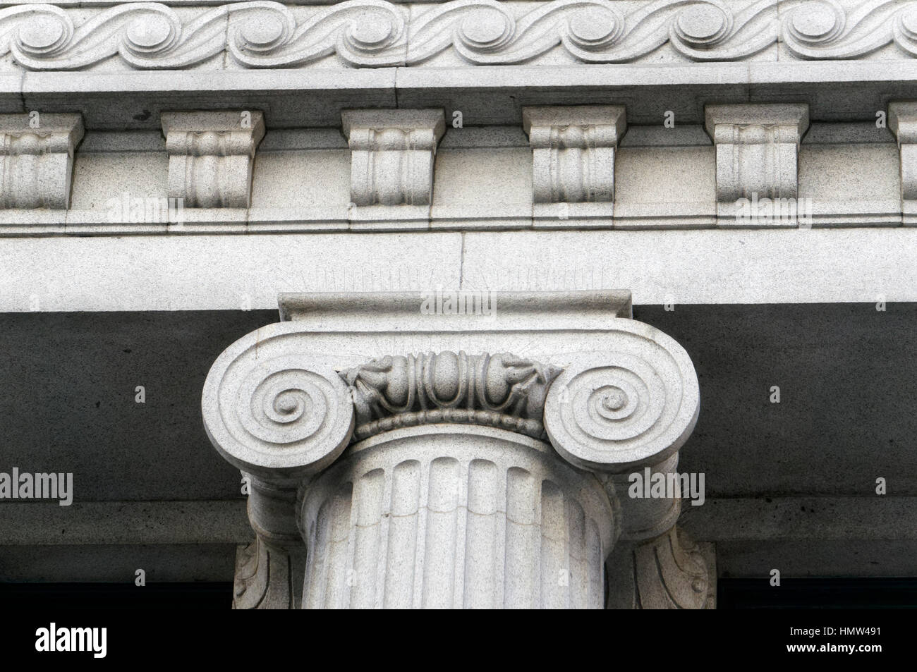 Detail of Ionic column capital and cornice of the Birks Building in ...