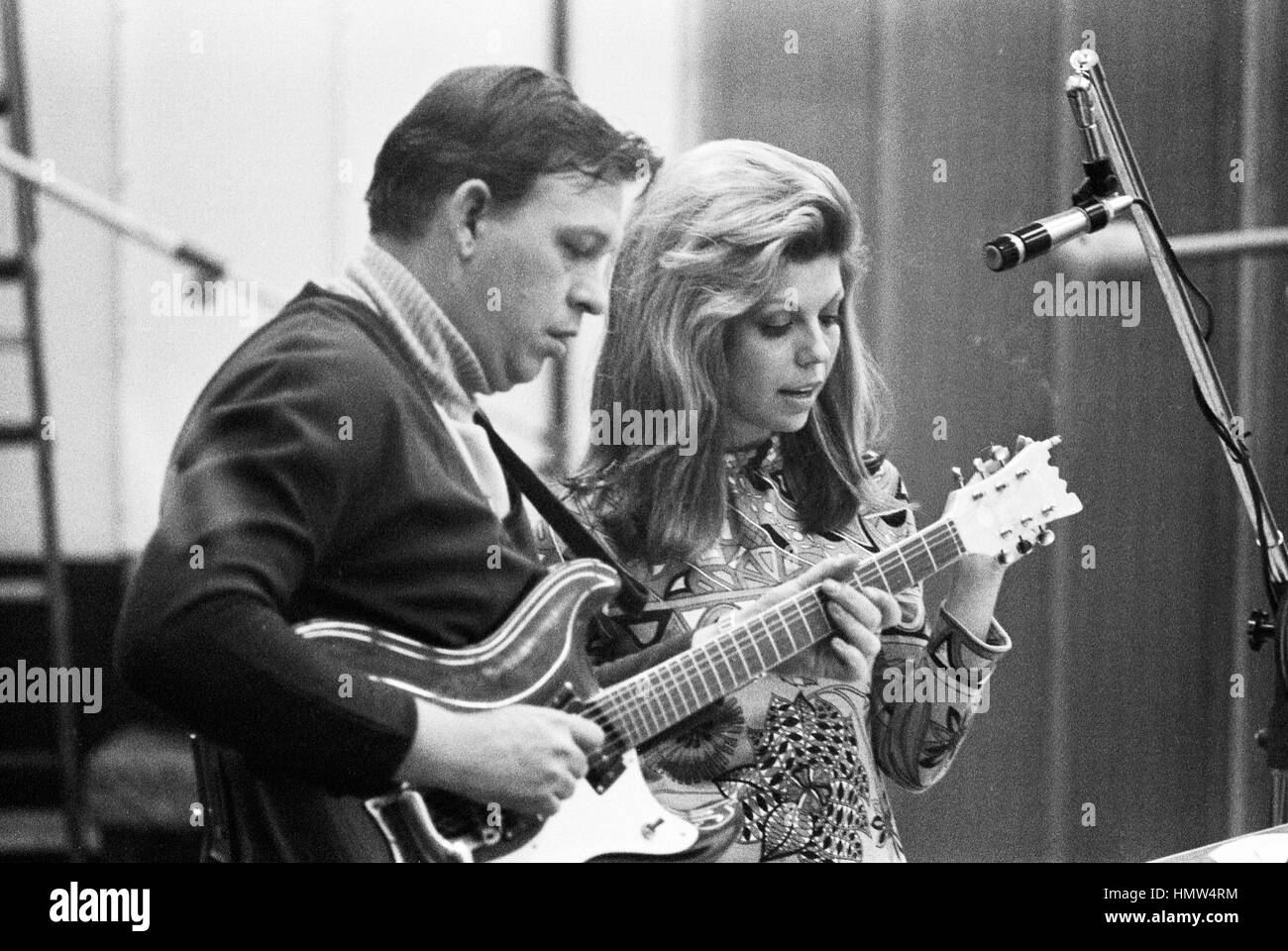 Nancy Sinatra and Billy Strange in a recording studio in 1966 Stock ...