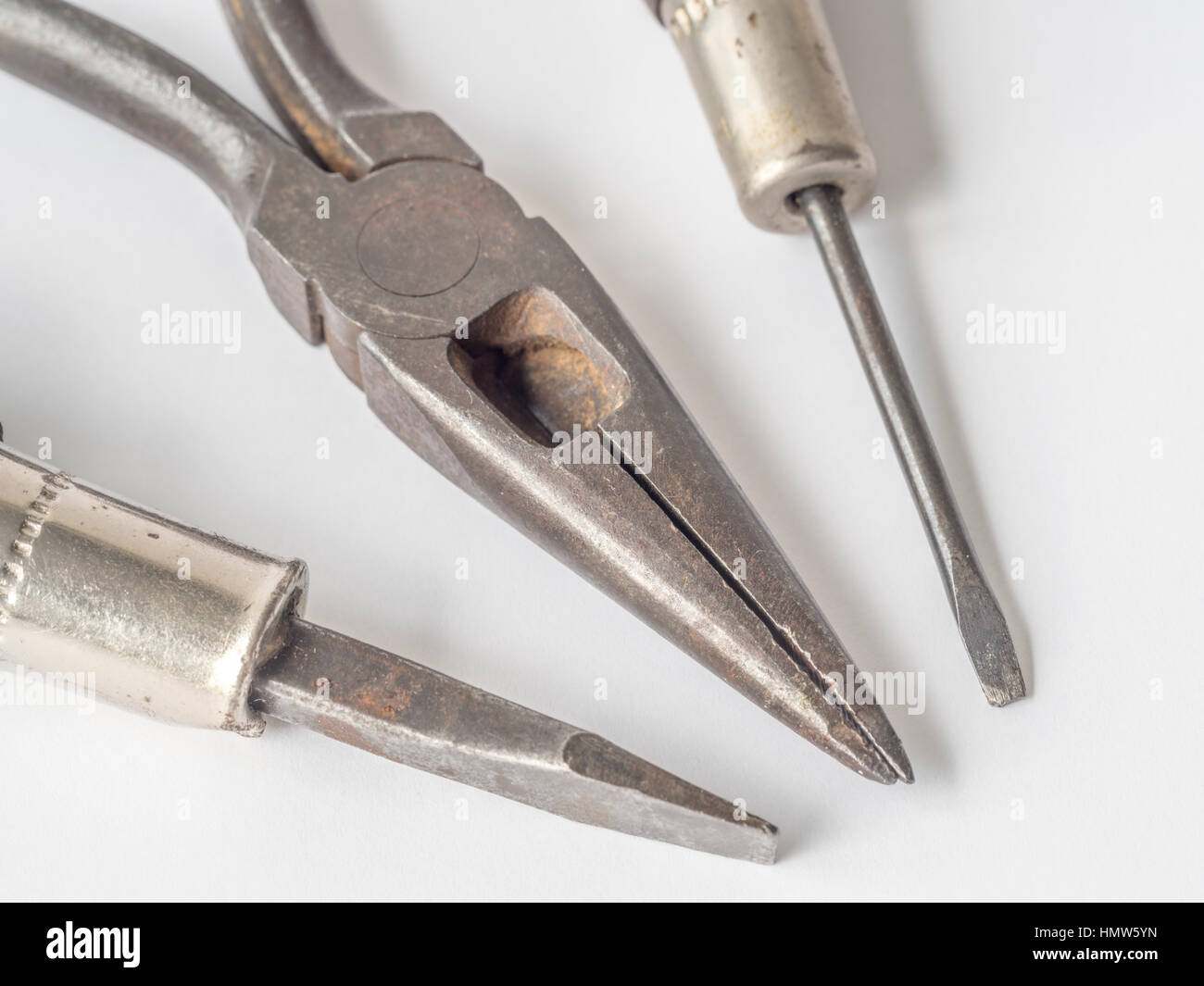Very old hand tools, pliers and screw drivers Stock Photo - Alamy