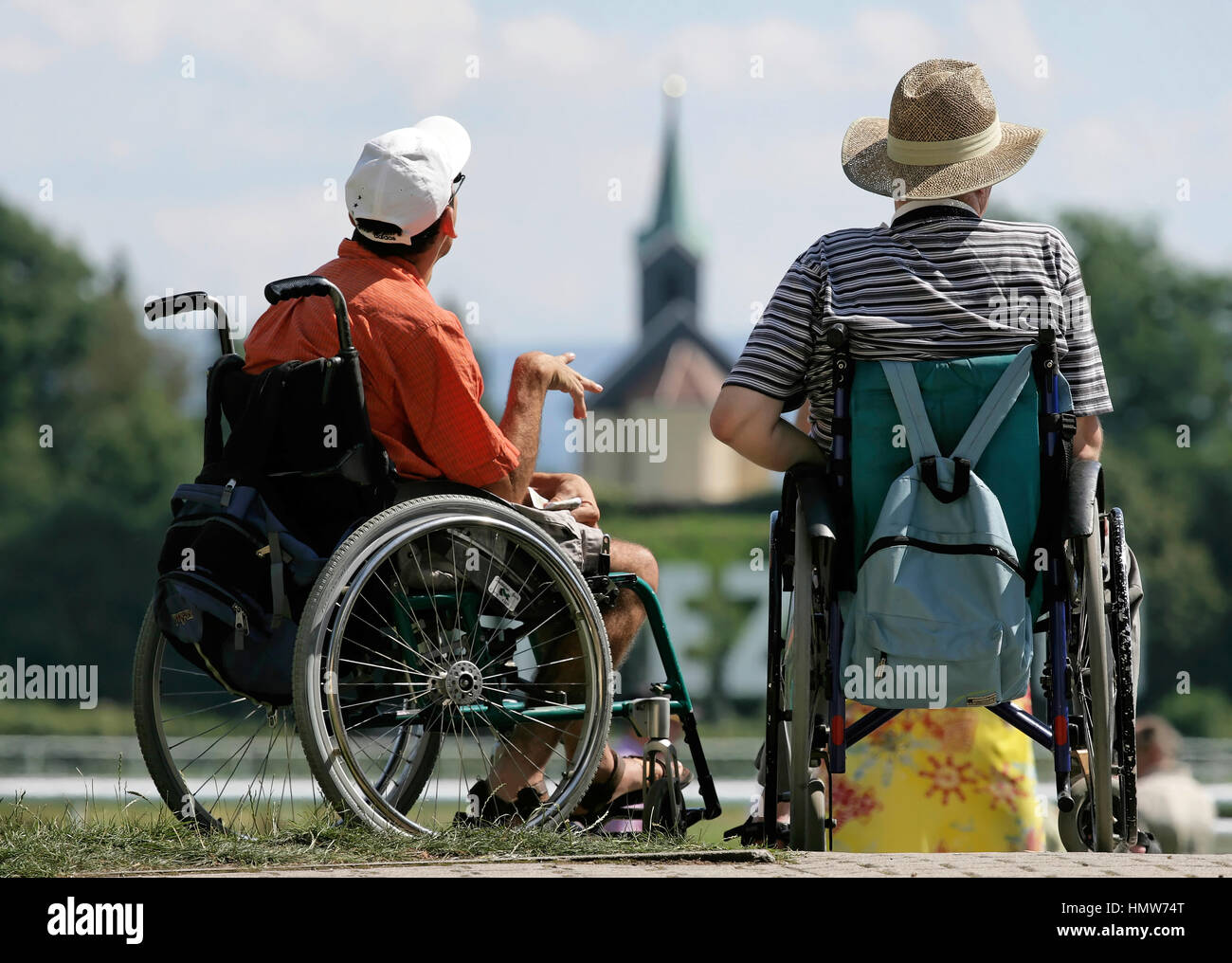 Some in wheelchairs hi-res stock photography and images - Alamy