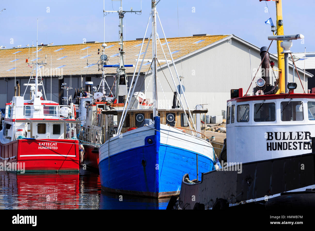 colourful Fishing trawlers in the harbour of Hundested, Denmark Stock ...