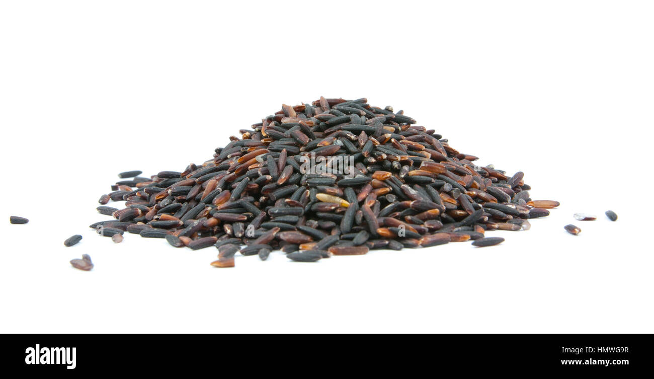 black long grain rice isolated on white Stock Photo - Alamy