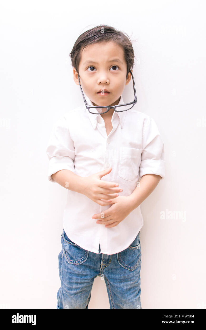 white shirt on little smart asian boy Stock Photo - Alamy