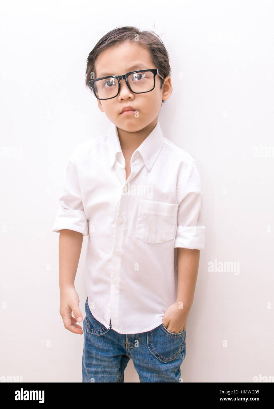 white shirt on little smart asian boy Stock Photo - Alamy