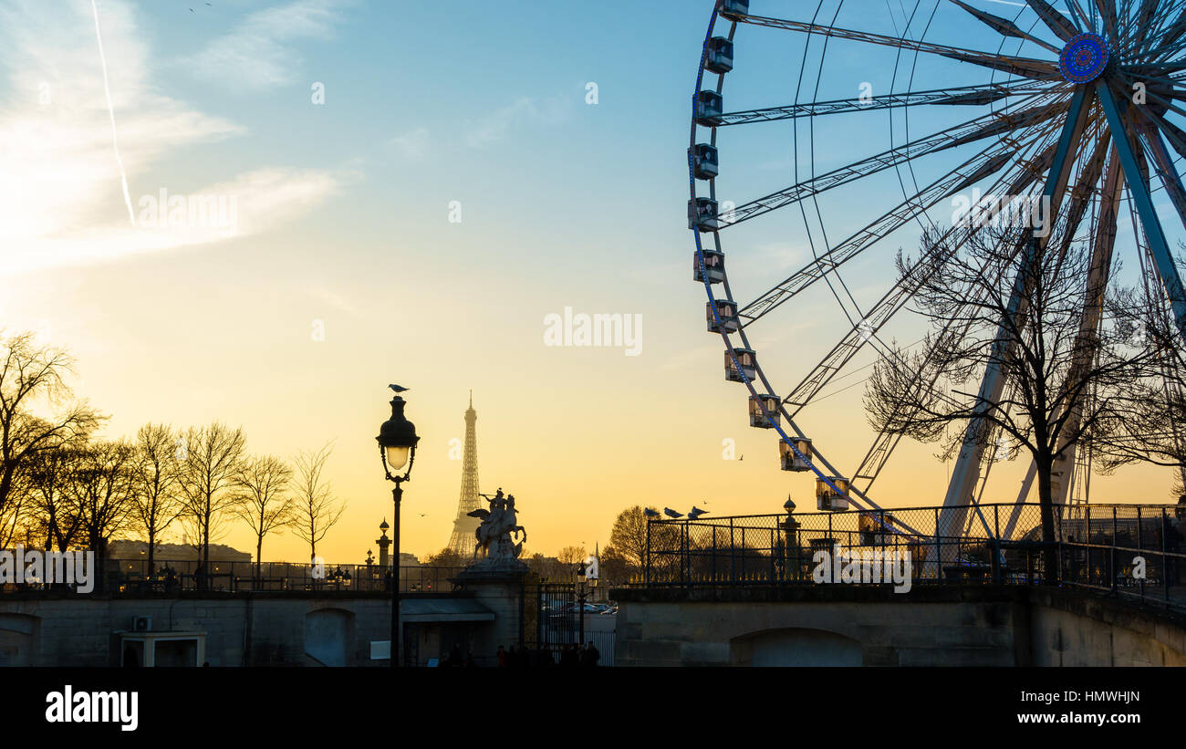 The ferris wheel and the Eiffel Tower in Paris, France Stock Photo - Alamy