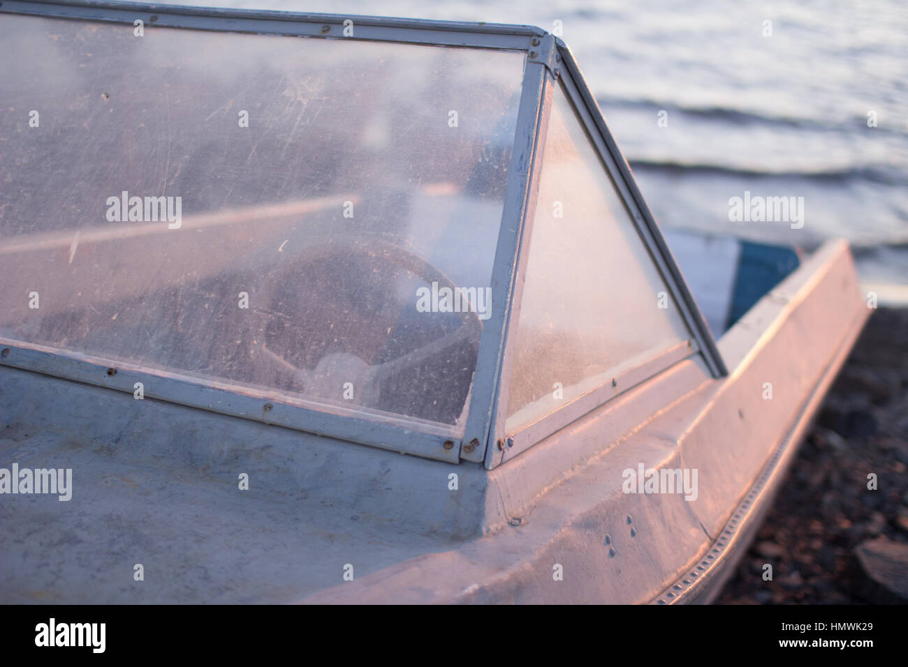 Old rowing boat on pebble beach hi-res stock photography and images - Alamy