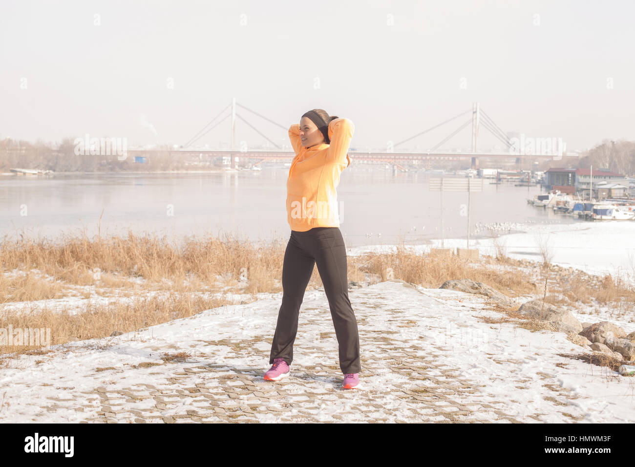 Fitness young woman exercise outdoor, winter season healthy activity ...