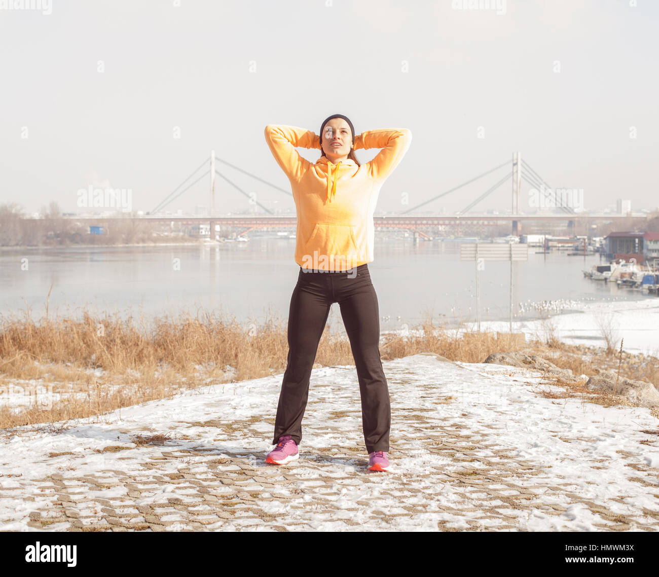Fitness young woman exercise outdoor, winter season healthy activity ...