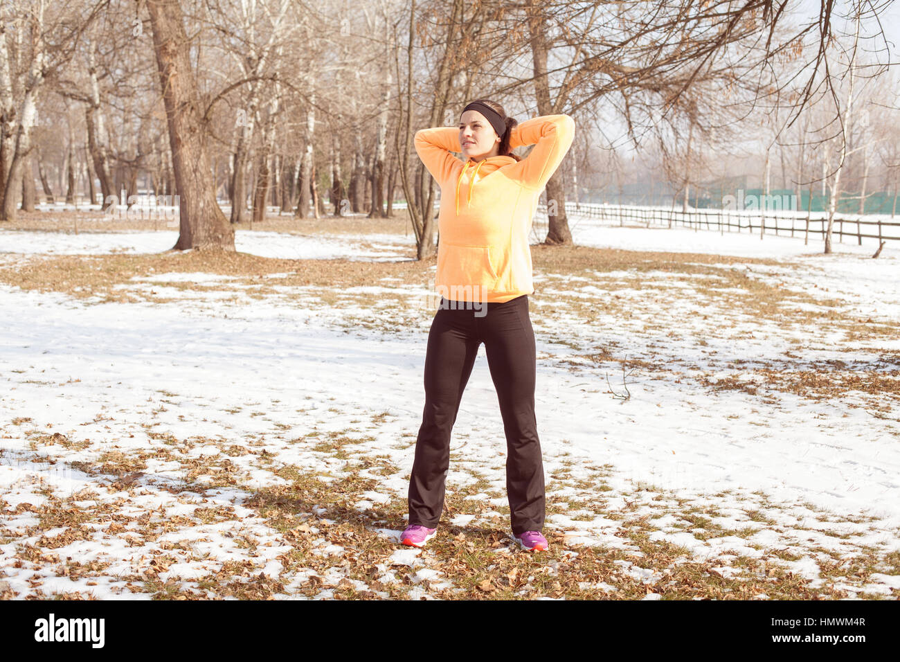 Fitness young woman exercise outdoor, winter season healthy activity ...