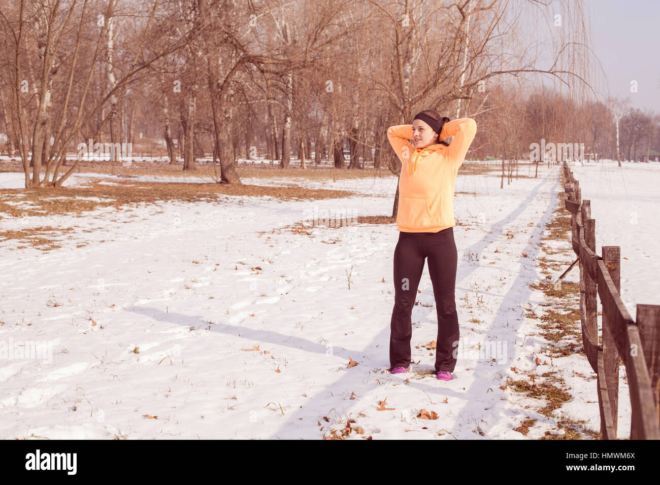 Fitness young woman exercise outdoor, winter season healthy activity ...
