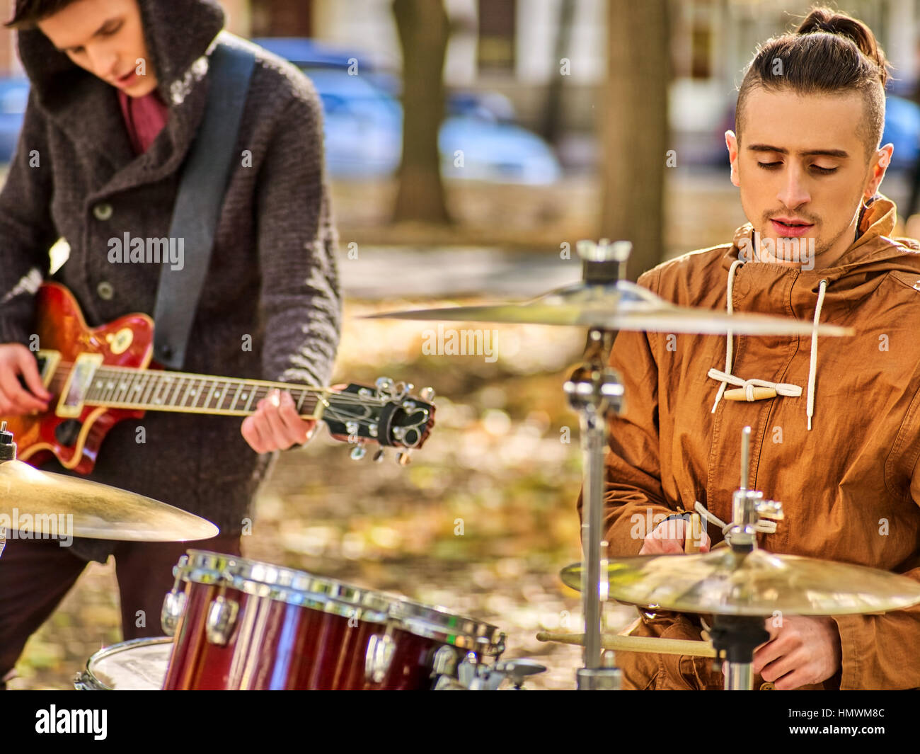 Festival music band. Friends playing on percussion instruments city ...