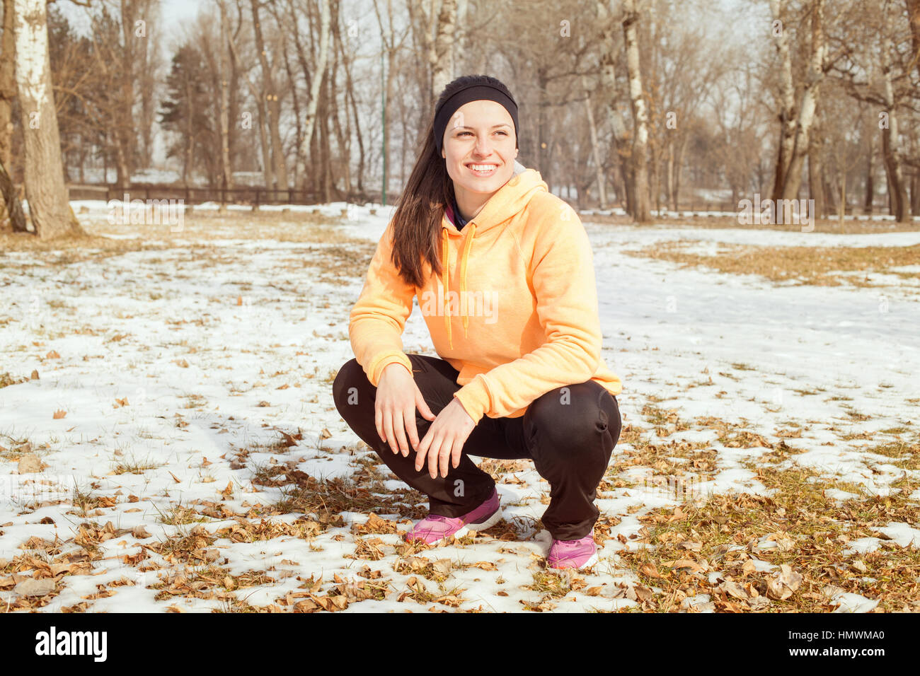 Fitness young woman enjoying winter day in nature Stock Photo - Alamy