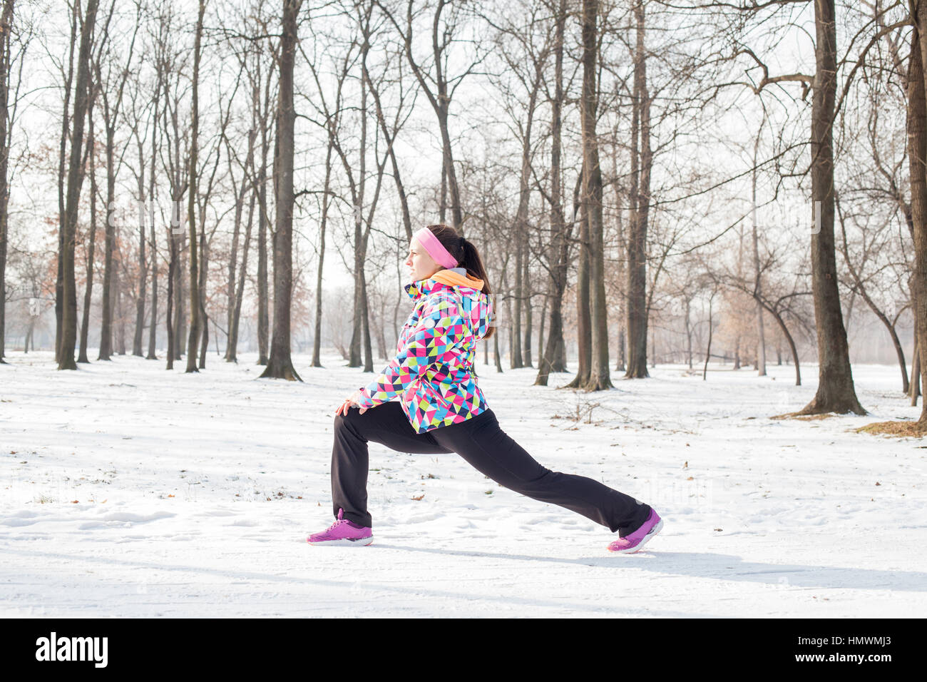 Fitness young woman exercise outdoor, winter season healthy activity ...