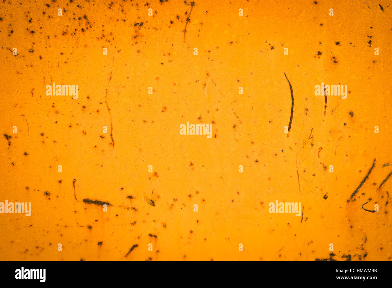 Orange and scratched background texture Stock Photo - Alamy