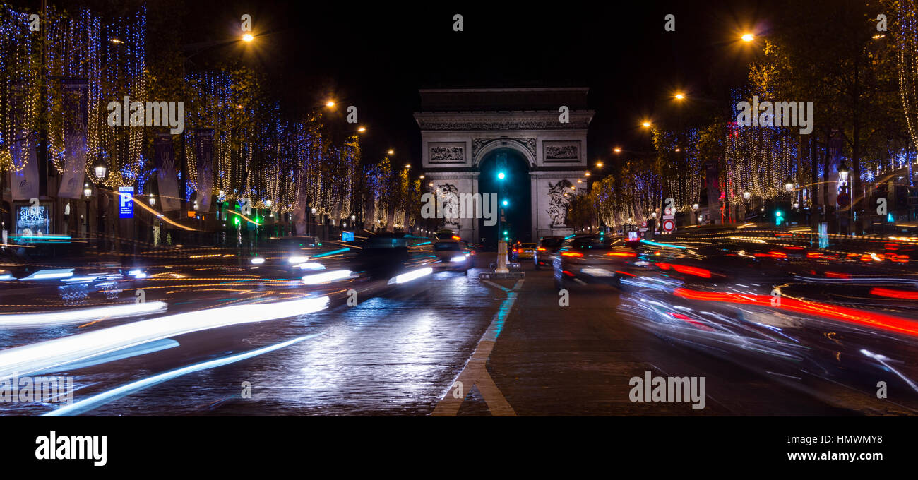 Champs Elysees in Paris illuminated for Christmas and Triumphal Arch in ...
