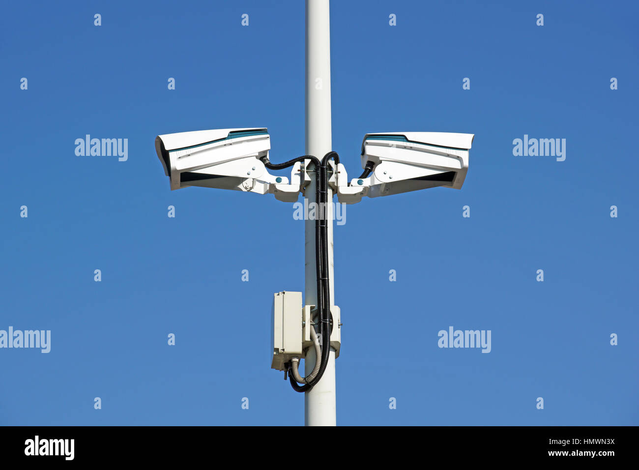 Security camera with blue sky for surveillance Stock Photo - Alamy