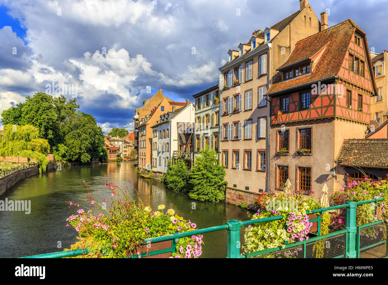 The Ill river in Petite France area with traditional architecture ...