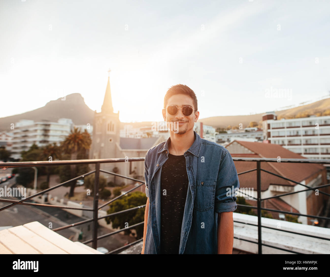 Man rooftop terrace hi-res stock photography and images - Alamy