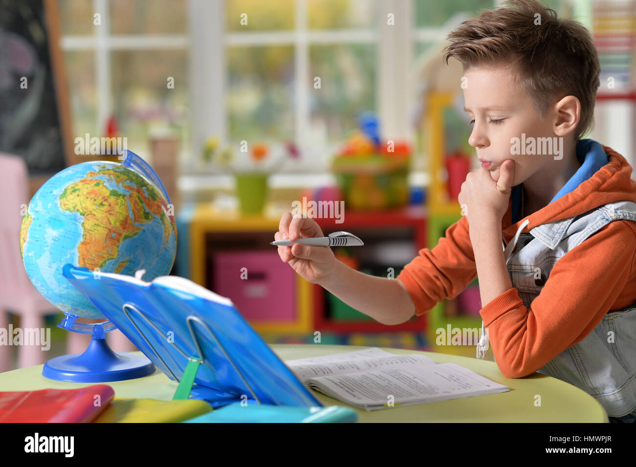 little boy doing lessons Stock Photo - Alamy