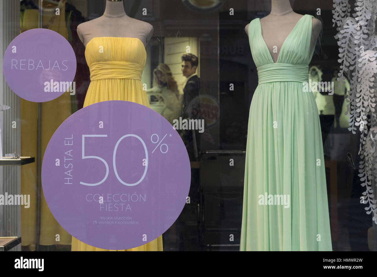 A shop front sign announces discounts on the first day of the winter ...