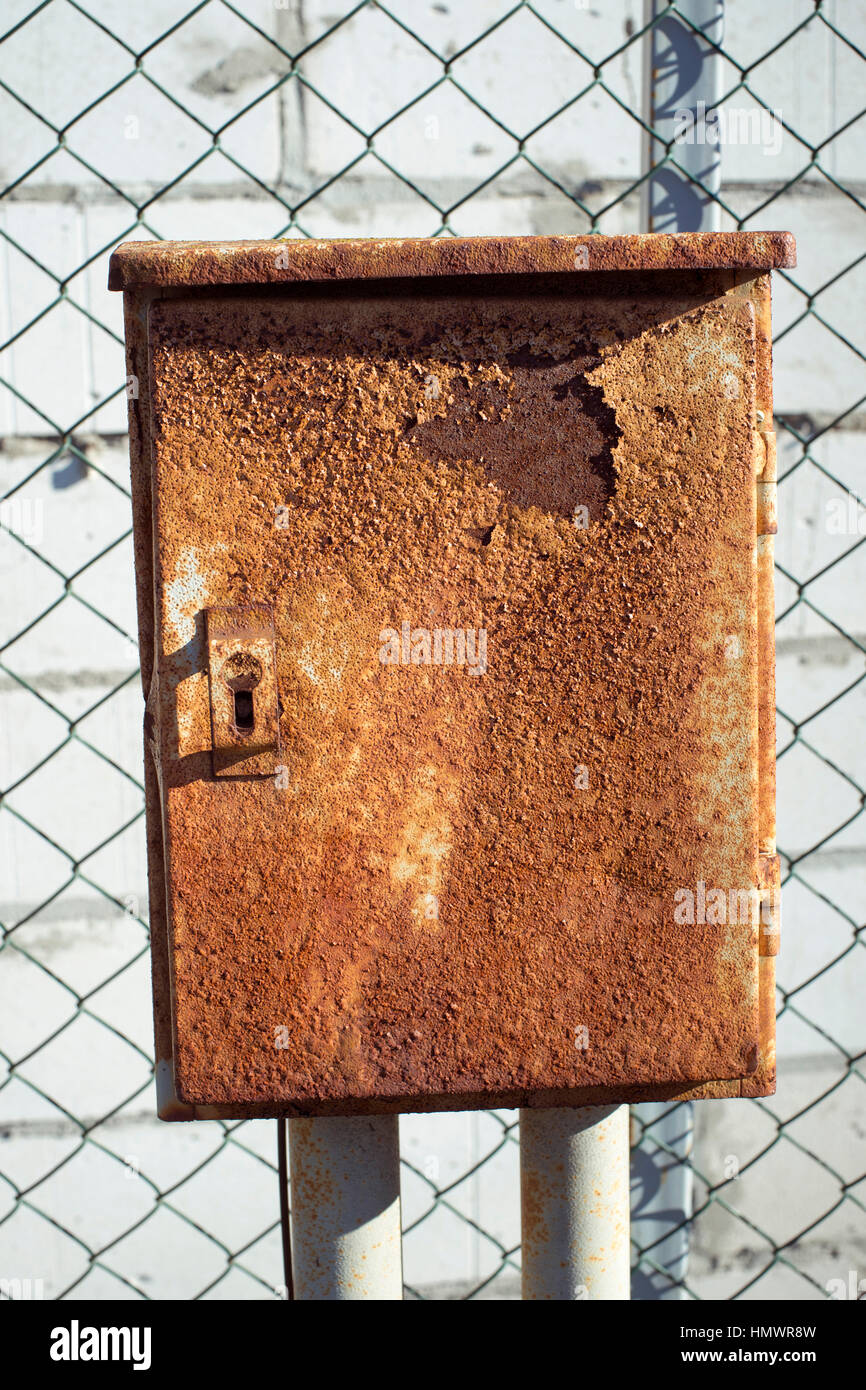 rusty metallic box with keyhole outdoor Stock Photo - Alamy