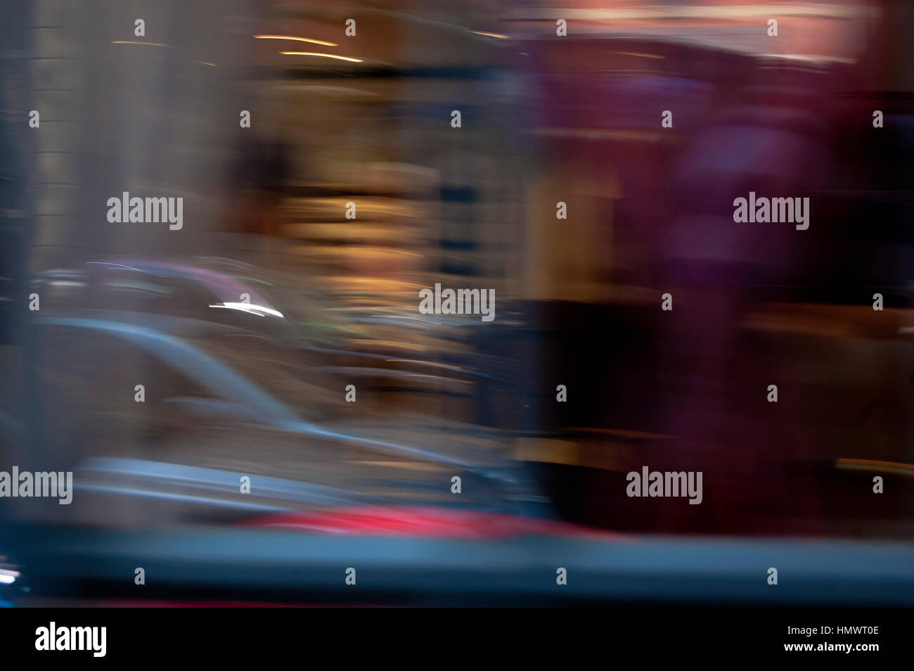 Defocused store window with cars and pedestrians motion blur vintage ...
