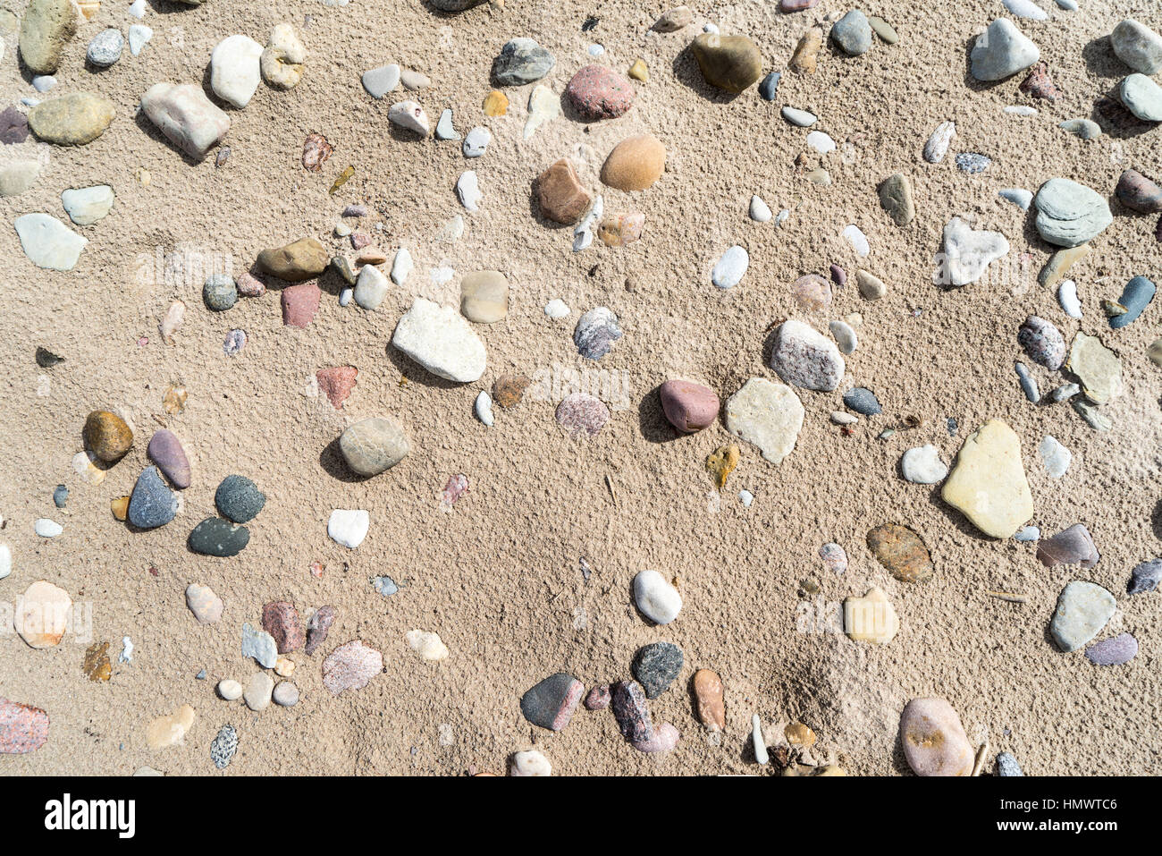 rocky beach with sand and pebbles Stock Photo - Alamy