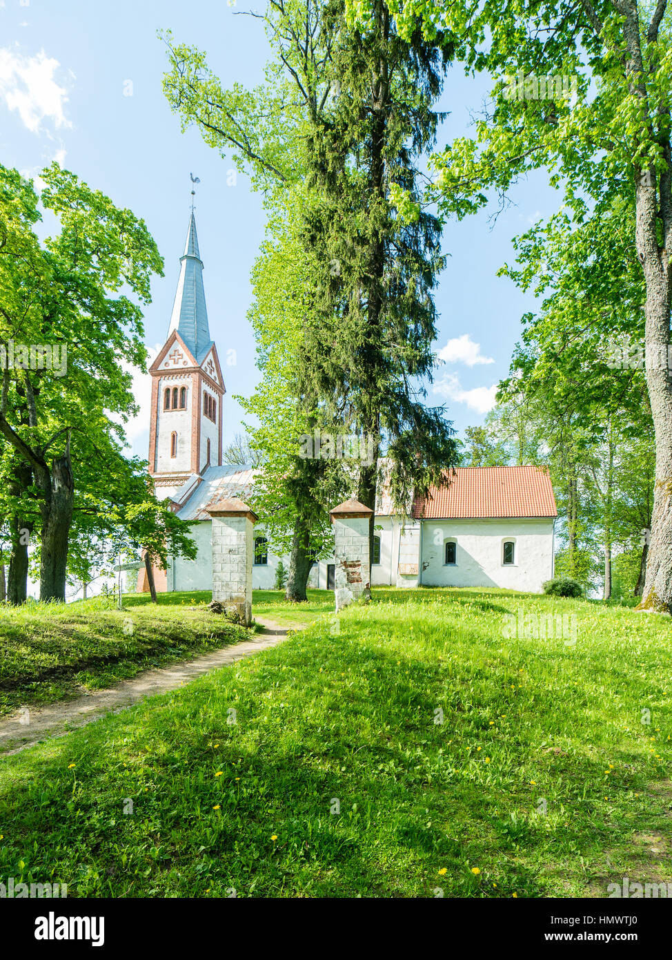 countryside church building in summer in small village Stock Photo - Alamy
