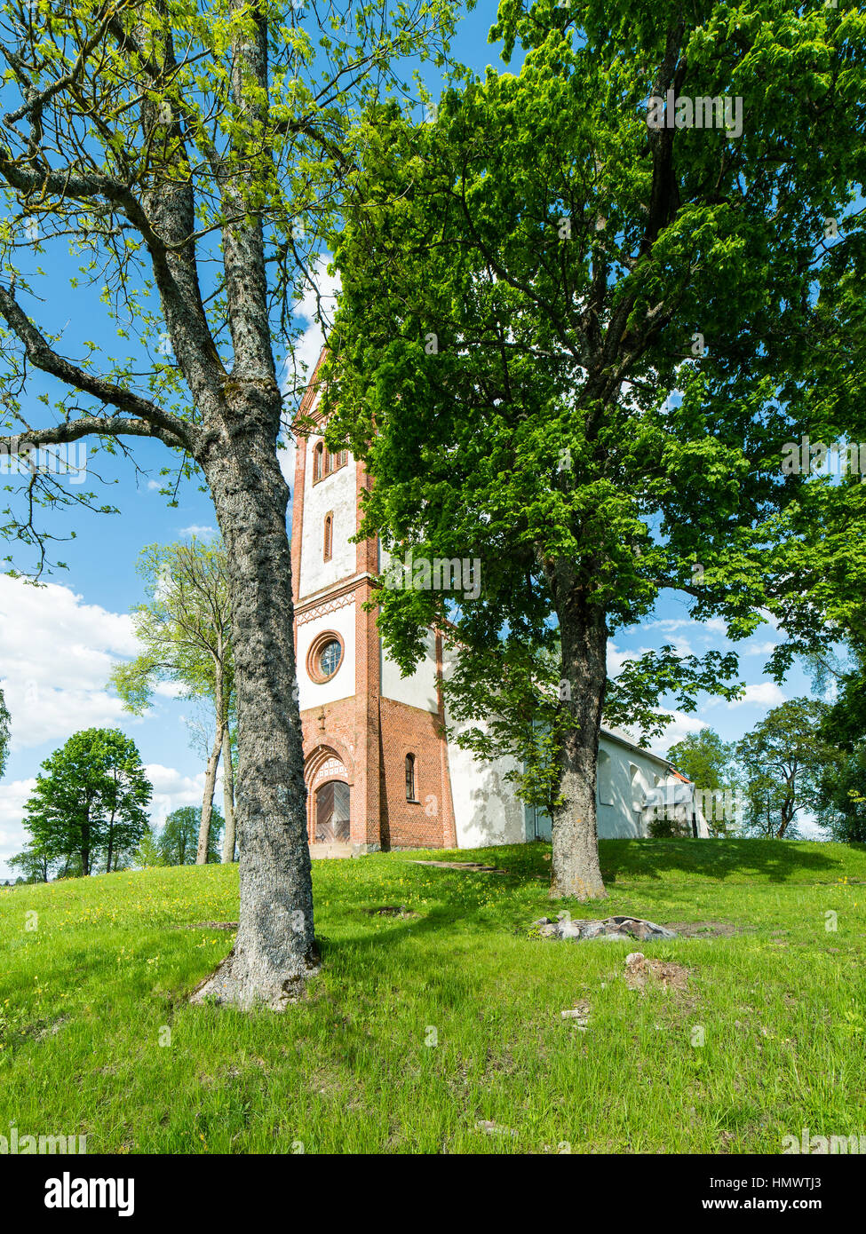 countryside church building in summer in small village Stock Photo - Alamy
