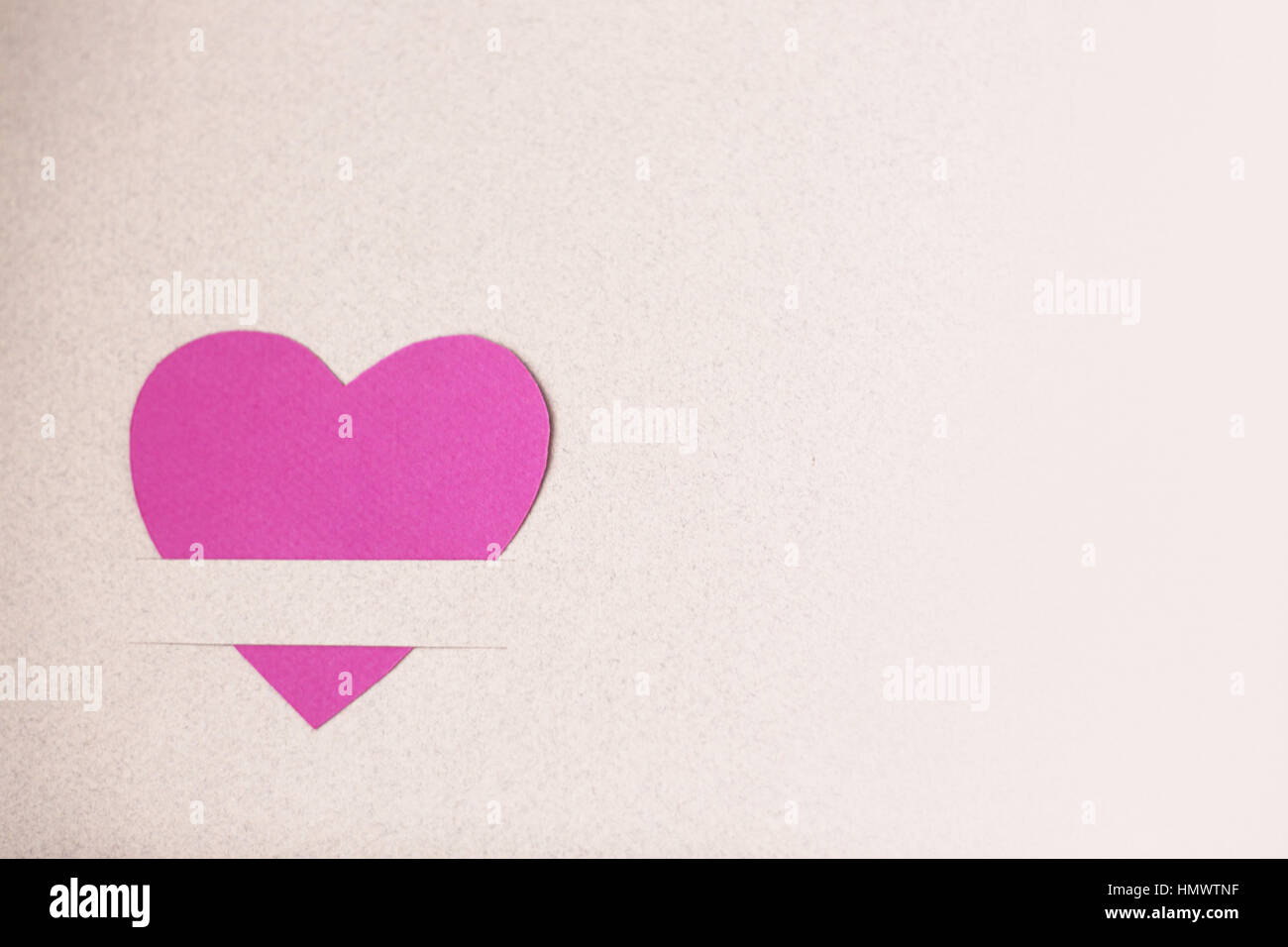 Pink paper hearts on light paper textured background Stock Photo - Alamy