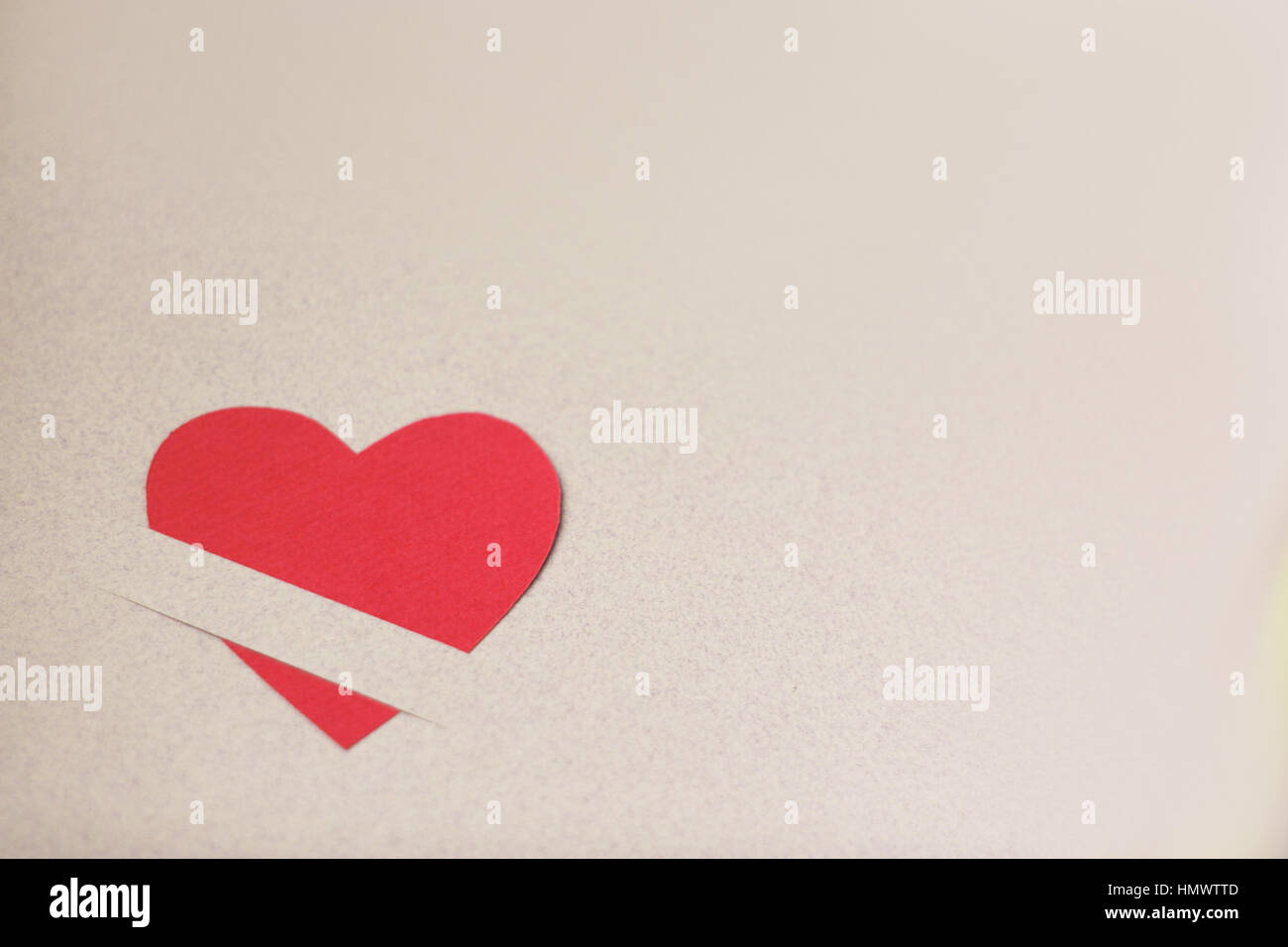 Red paper hearts on light paper textured background Stock Photo - Alamy