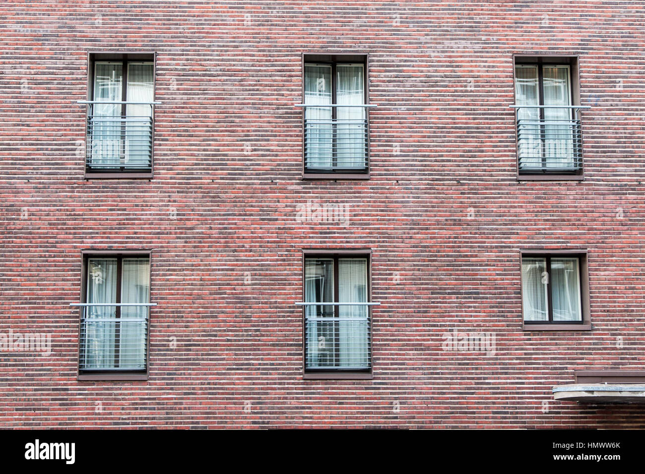 brick wall with windows Stock Photo - Alamy