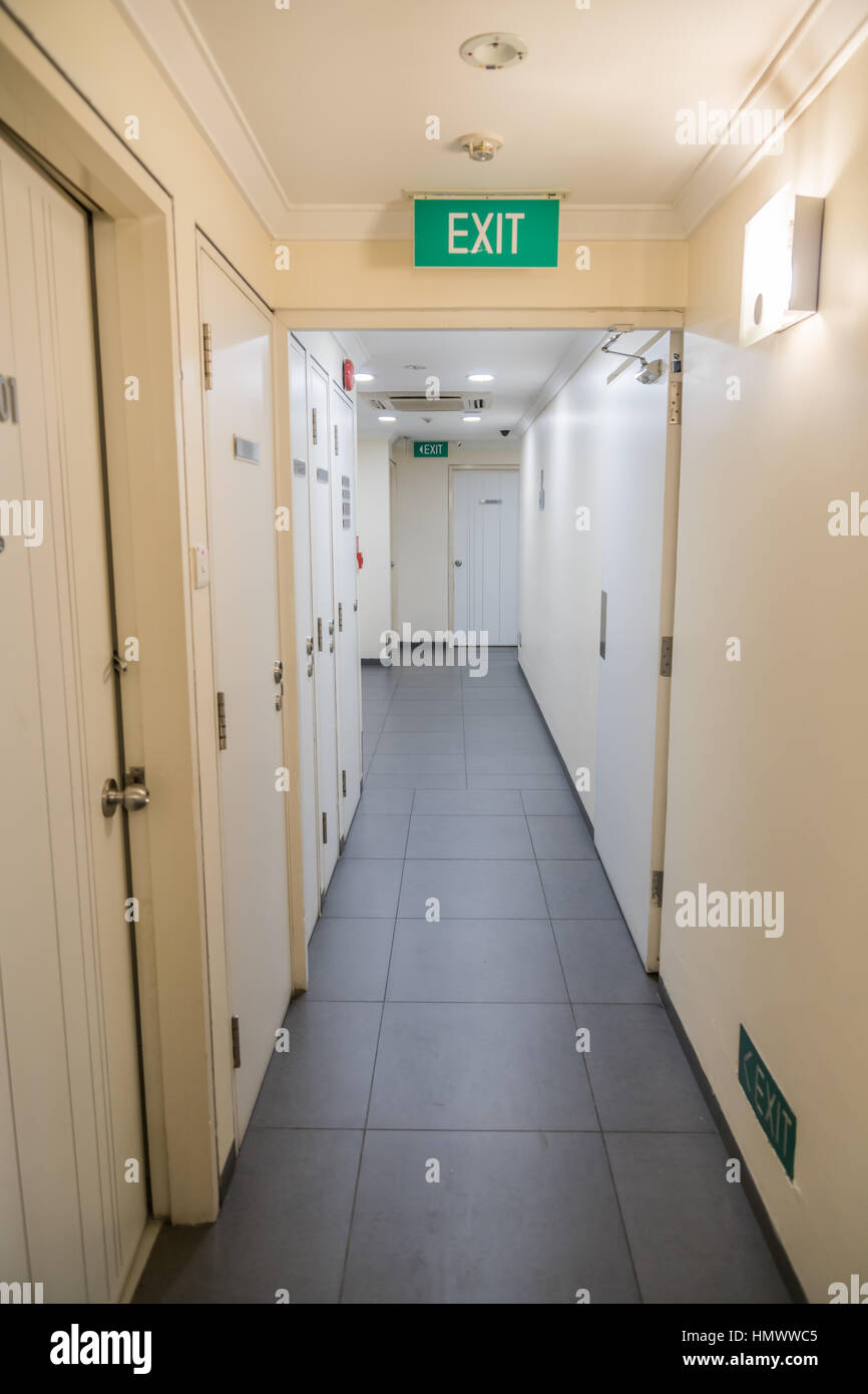 Corridor with closed doors in office residential building or hotel ...