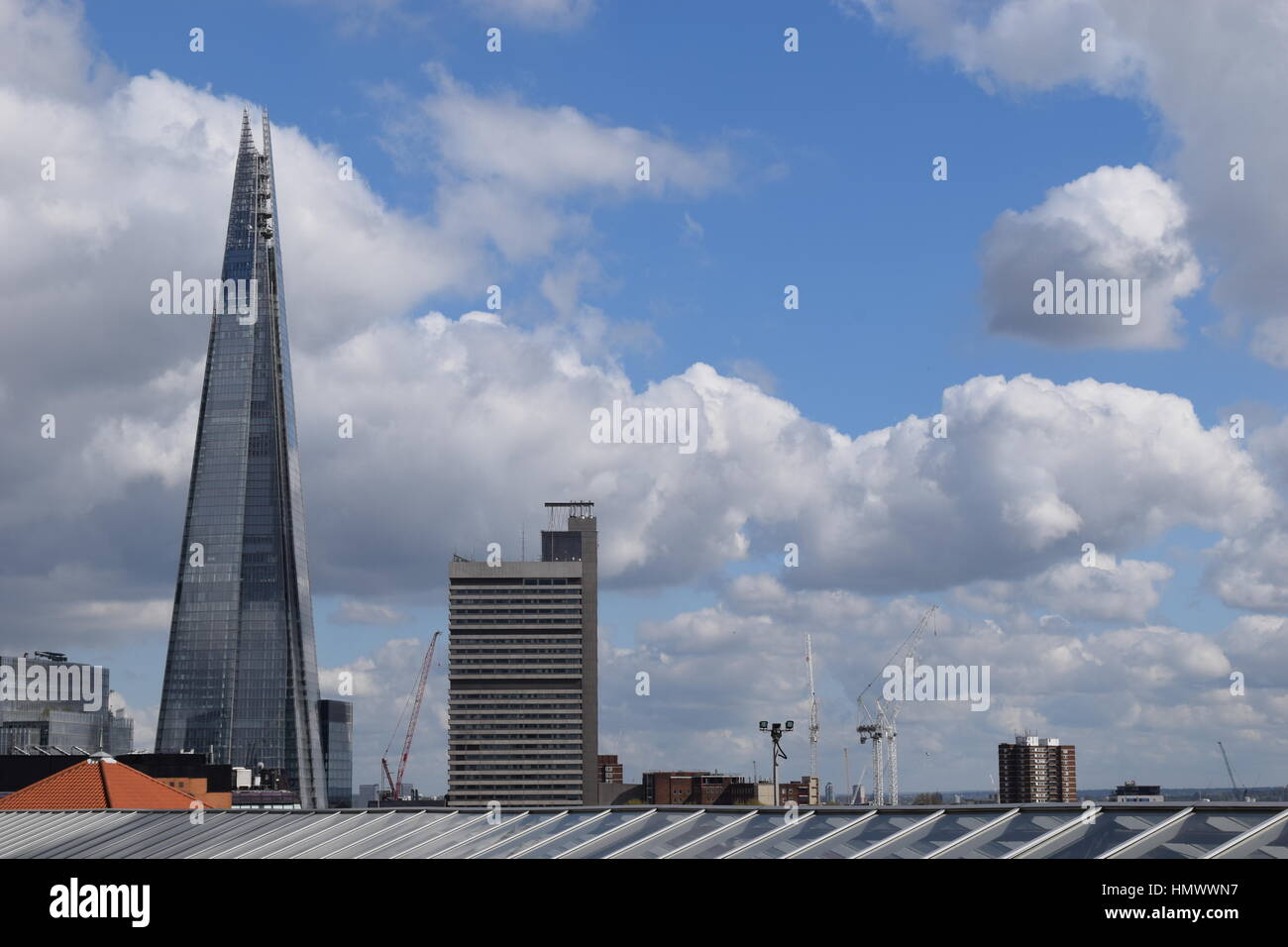 The Shard, London city skyline with blue / cloudy sky Stock Photo - Alamy