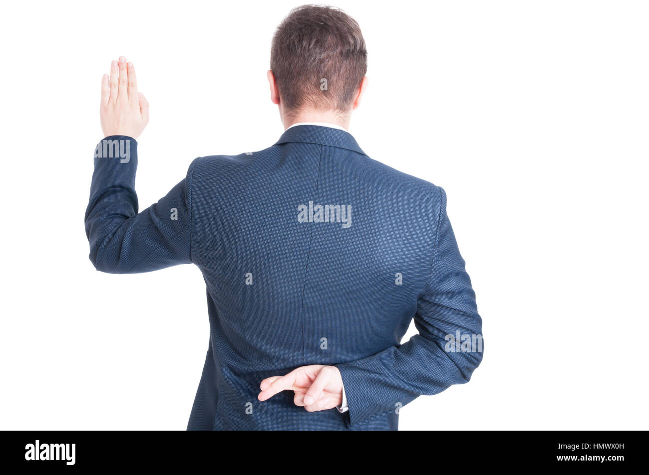 Back view of business man or politician standing raising hand taking ...